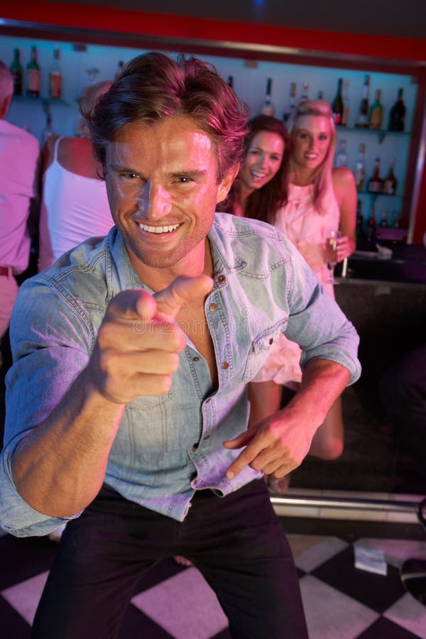 Young Man Having Fun in Busy Bar Stock Photo - Image of vacation ...