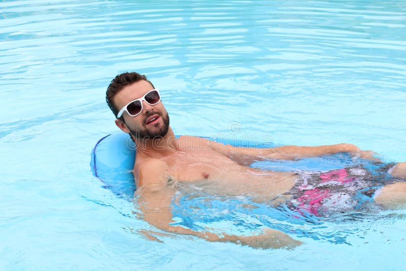 Young Man Having Fun in the Pool Stock Image - Image of casual, angle ...