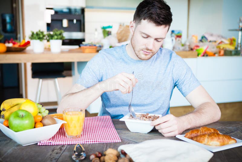 Young man breakfast stock image. Image of juice, diet - 110546909