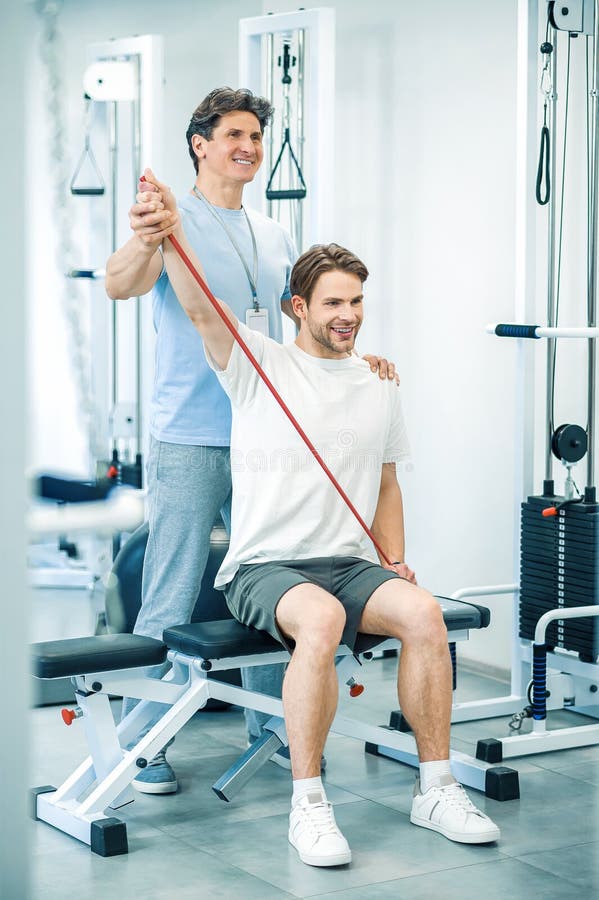 Young Man Having a Physical Therapy Session with a Doctor Stock Photo ...