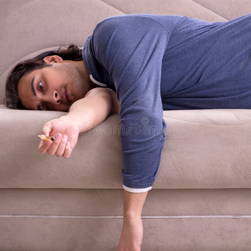 Young Man Having Problems with Narcotics at Home Stock Photo - Image of ...