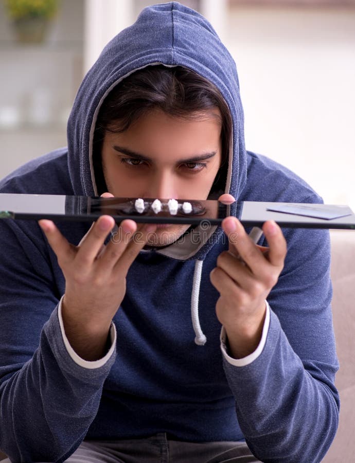 Young Man Having Problems with Narcotics at Home Stock Photo - Image of ...