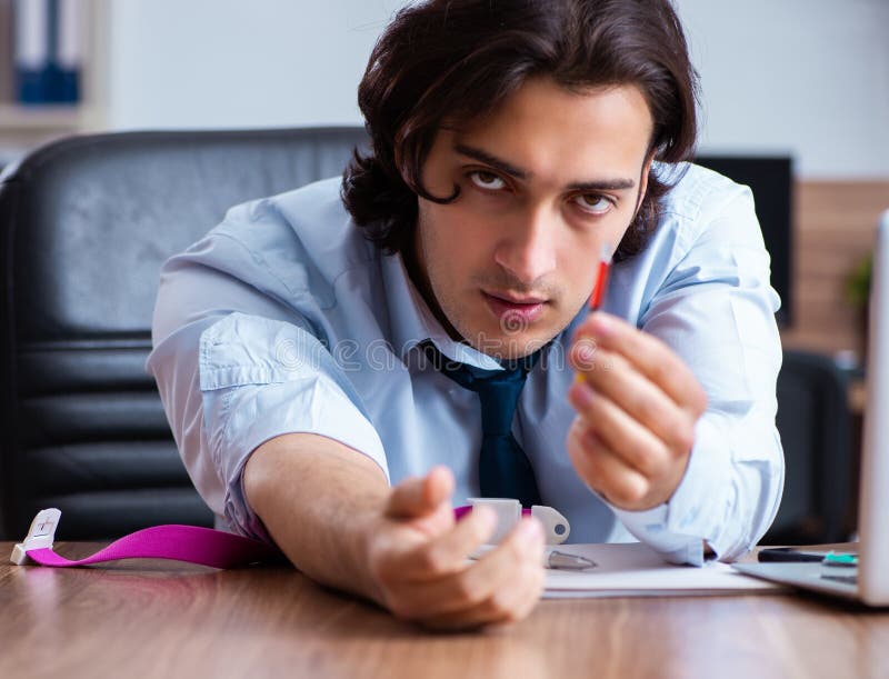 Young Man Having Problems with Narcotics at Workplace Stock Photo ...