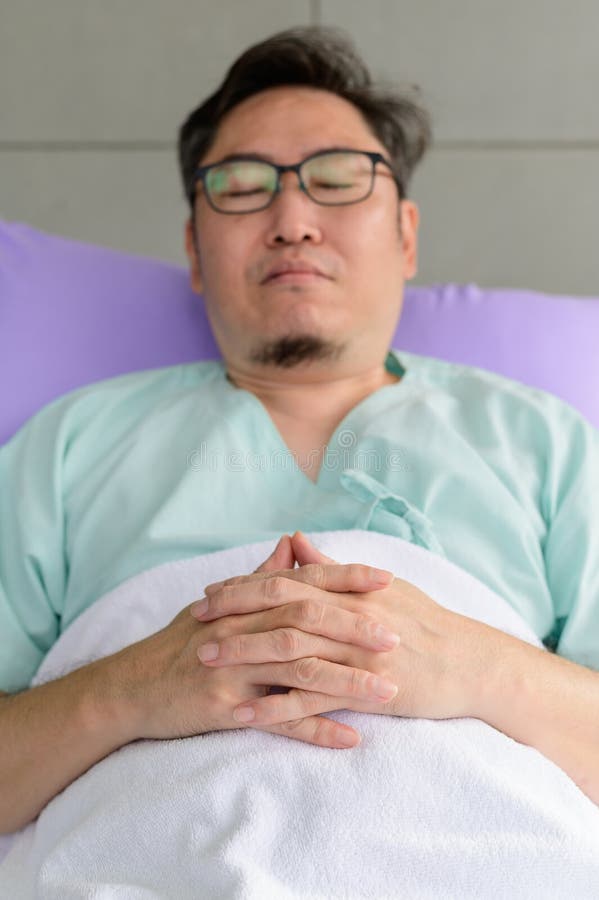 Young Man Having a Restful Sleep in a Hospital Bed Stock Image - Image ...