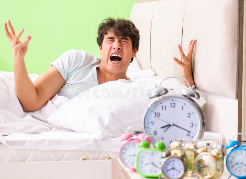 Young Man Having Trouble Waking Up in Early Morning Stock Photo - Image ...