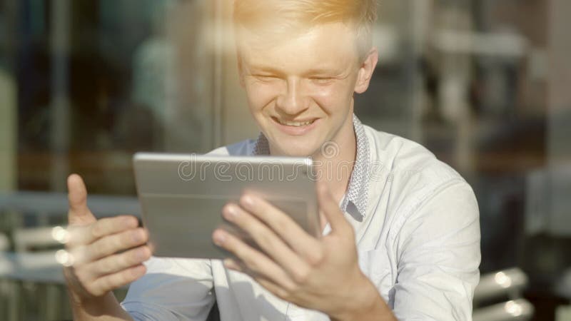 Young Man Having a Video Call on Mobile Tablet Screen Talking Stock ...