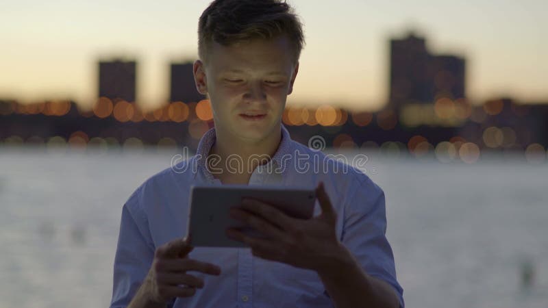Young Man Having a Video Call on Mobile Tablet Screen Talking Stock ...