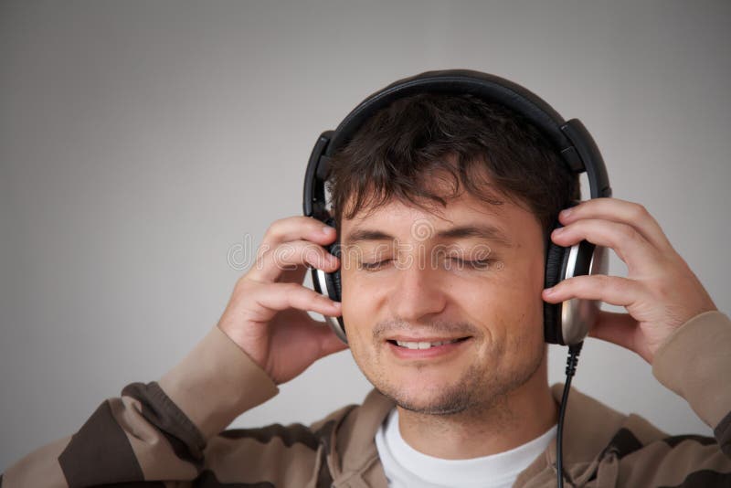 Young man with headphones stock photo. Image of face - 11128218