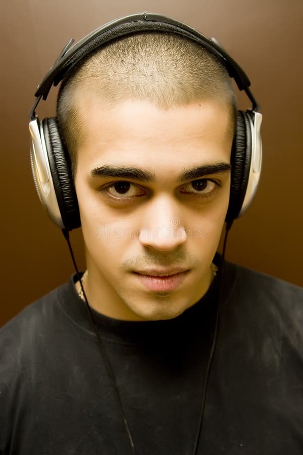 Young man with headphones stock photo. Image of lounge - 3300016