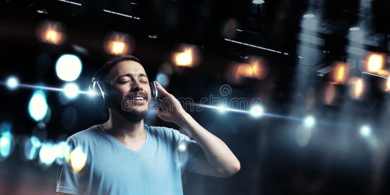 Young Man with Headphones . Mixed Media Stock Photo - Image of music ...