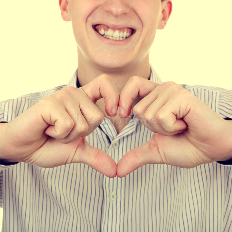 Young Man with Heart Shape stock photo. Image of single - 62036598