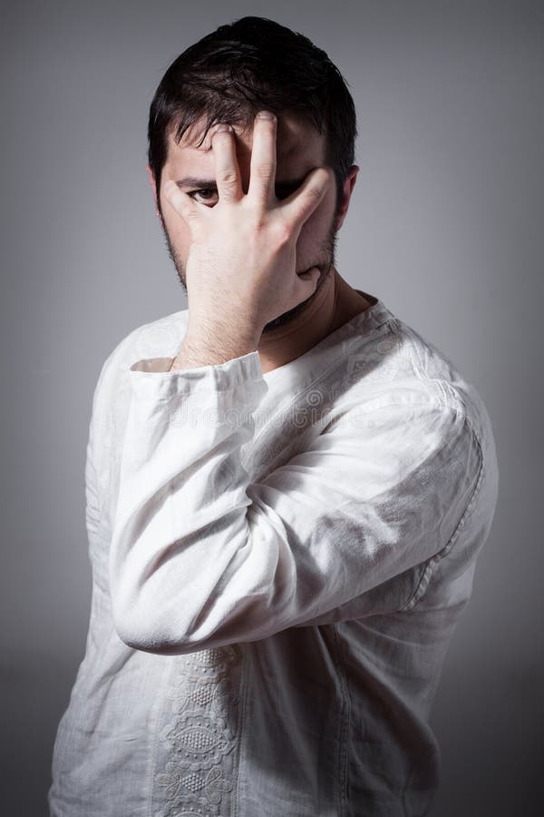 Anguished young man stock photo. Image of hair, anguish - 5621746