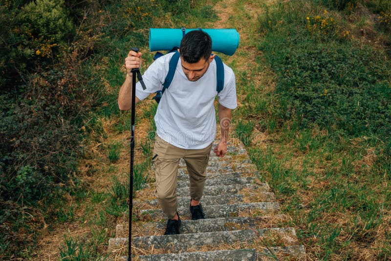 Young Man with Hiking Sticks Stock Photo - Image of nature, adventurous ...