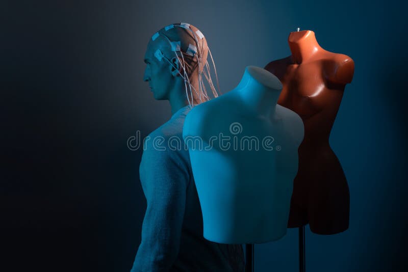 Young Man with His Head Entangled with Wires is Connected To an ...
