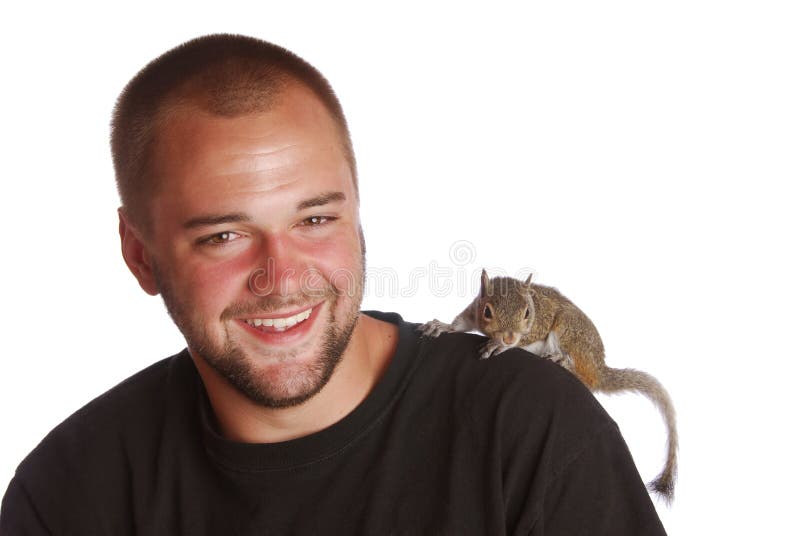 A Young Man and His Squirrel. Stock Photo - Image of male, squirrel ...