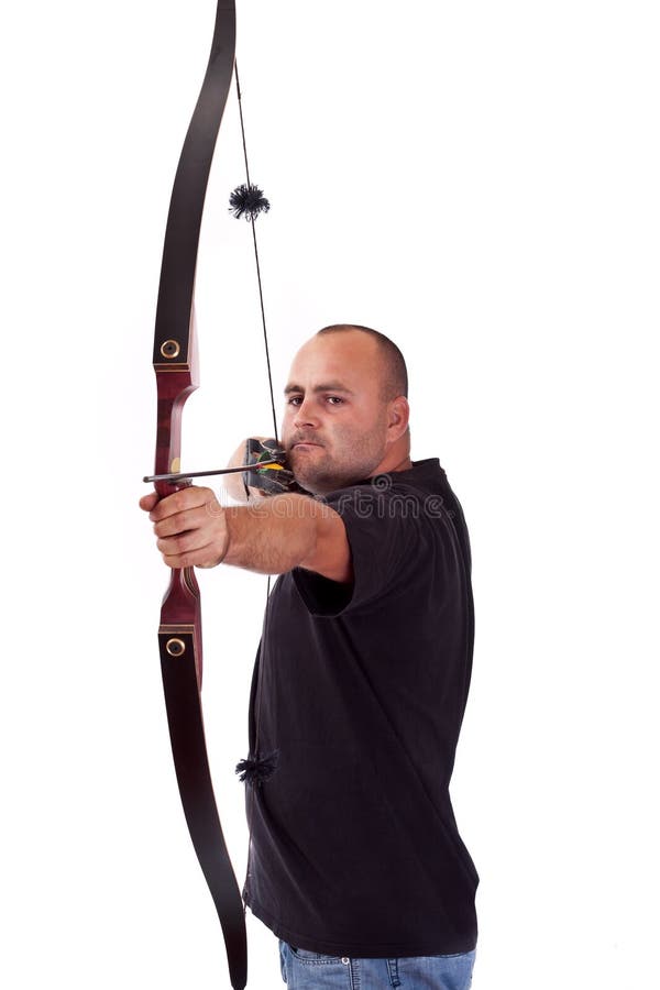 Young man holding bow stock photo. Image of focused, male - 22667536