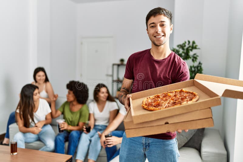 Young Man Holding Box of Take Away Pizza Standing at Home Stock Image ...