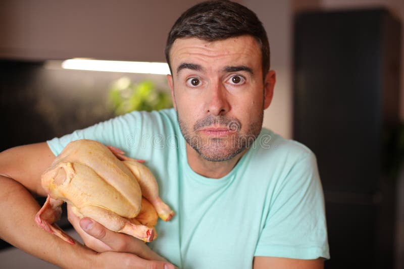 Young Man Holding a Chicken Stock Photo - Image of little, adult: 329622752