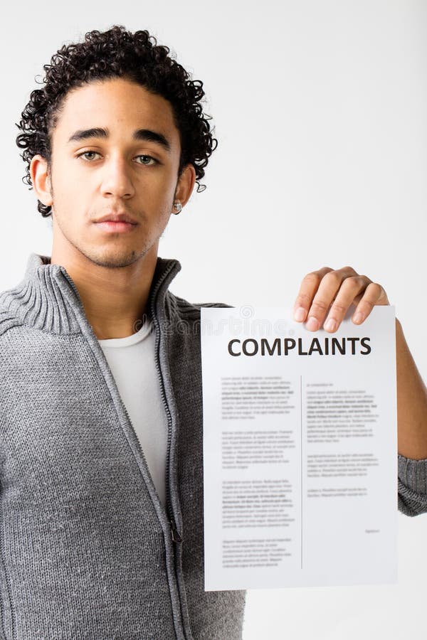 Young Man Holding Complaints Report Stock Image - Image of sheet ...