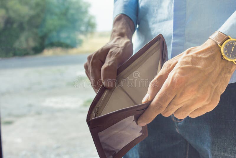 637 Sad Man Holding Empty Wallet Stock Photos - Free & Royalty-Free ...