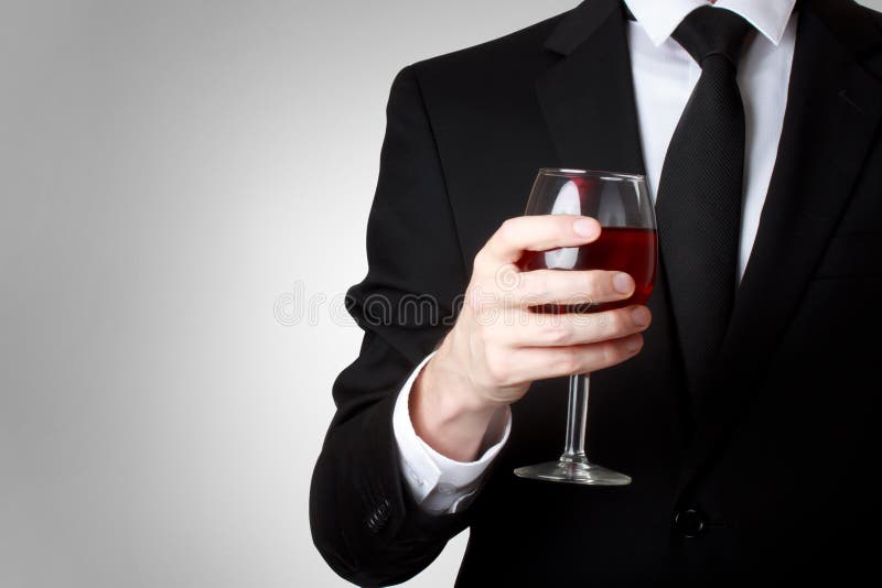 Young Man Holding a Glass of Red Wine Stock Image - Image of modern ...