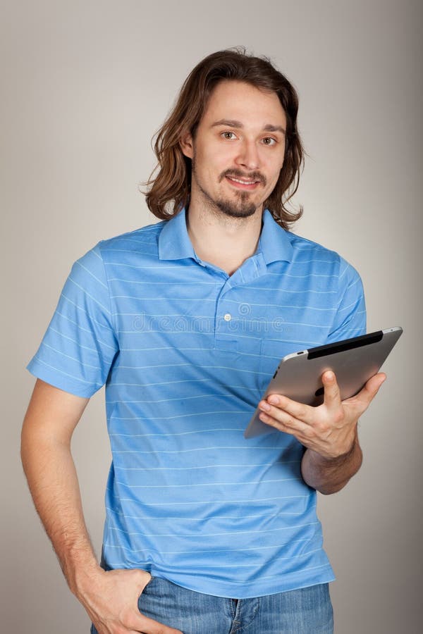 Young Man Holding Ipad Notebook Stock Photo - Image of notebook ...