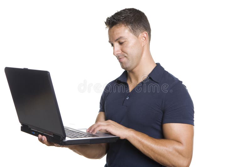 Young man holding laptop stock image. Image of expression - 15541591