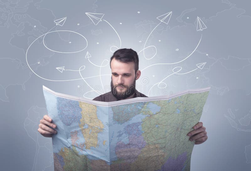 Young man holding map stock photo. Image of direction - 91817768