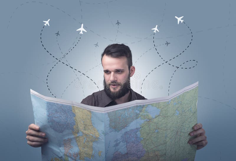 Young man holding map stock photo. Image of foreign, active - 99382564