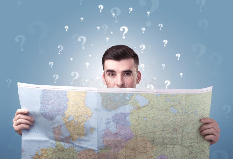 Young man holding map stock photo. Image of hike, city - 100377632