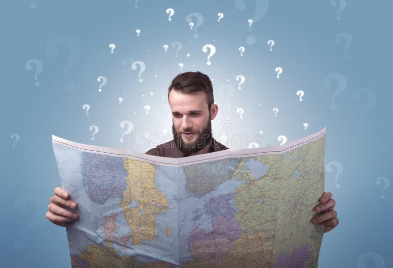 Young man holding map stock photo. Image of lifestyle - 84105894