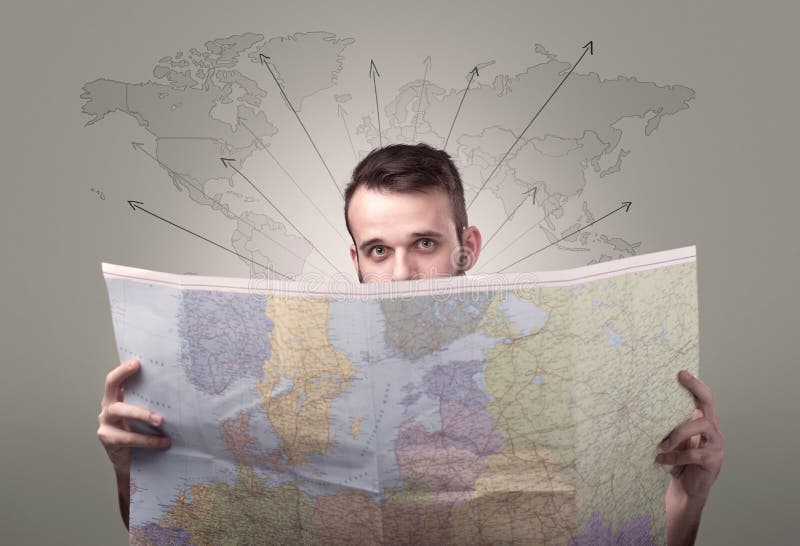 Young man holding map stock photo. Image of foreign, destination - 95991224