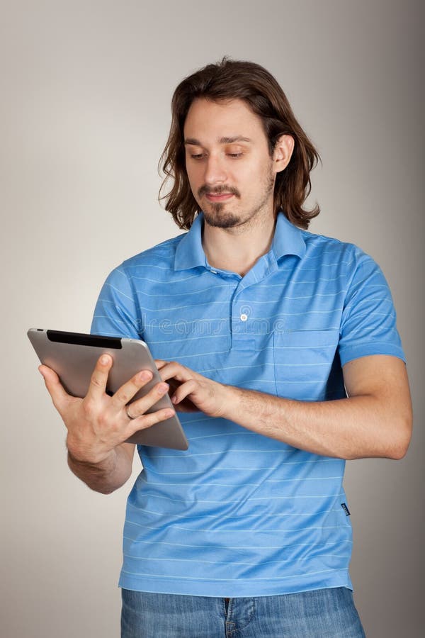 Young Man Holding Ipad Notebook Stock Photo - Image of lifestyle ...