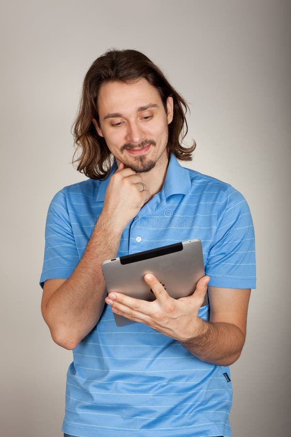 Young Man Holding Ipad Notebook Stock Photo - Image of lifestyle ...