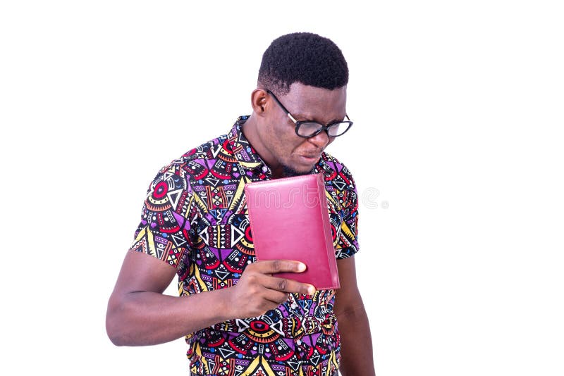 Young man holding notebook stock image. Image of businessman - 229340979