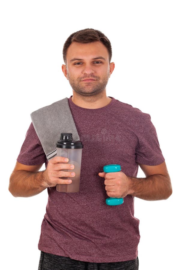 Young Man Holding a Protein Shake and a Dumbbell Stock Image - Image of ...