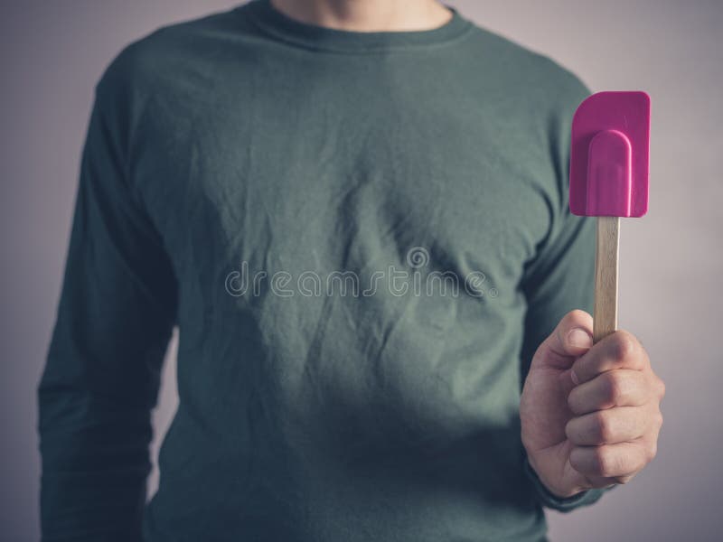 Young Man Holding a Spatula Stock Photo - Image of rvintage, hand: 55679382