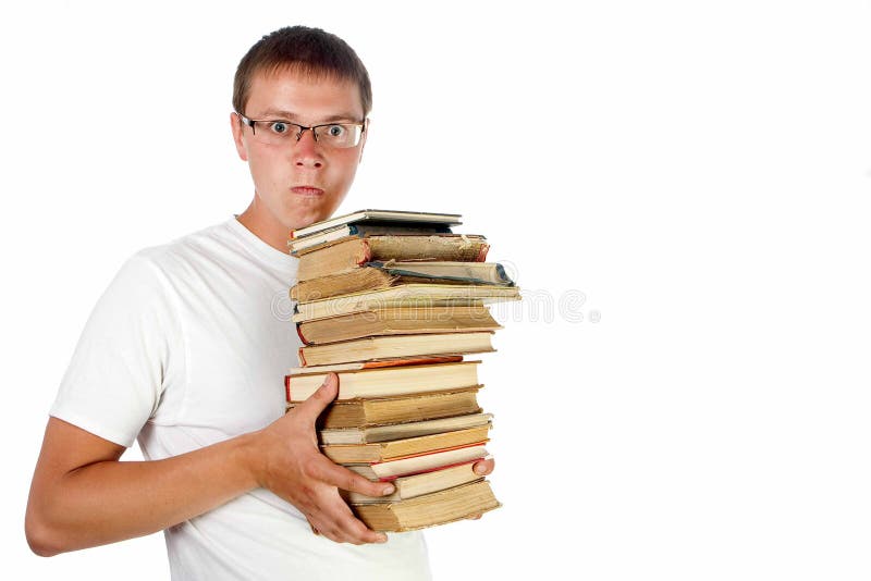 Young Man Holding Stack of Books Stock Image - Image of holding ...