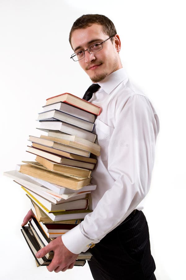 Young Man Holding Stack of Books Stock Photo - Image of businessman ...