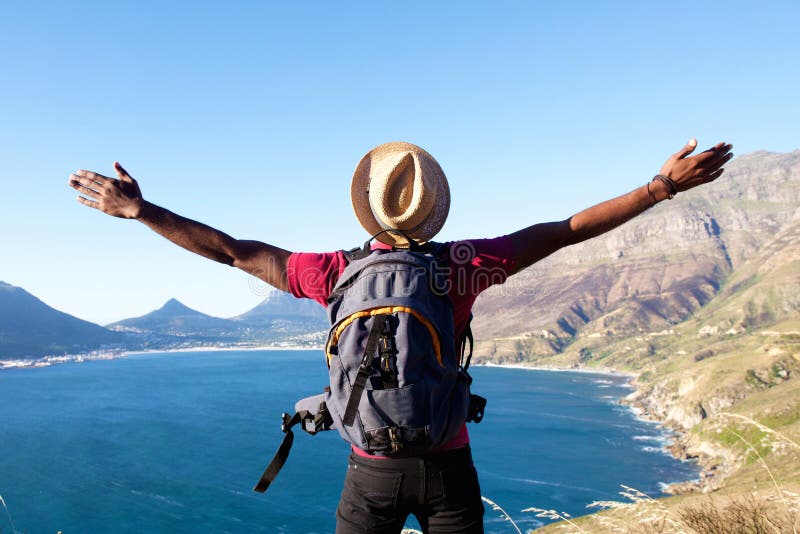 Young Man on Holiday Standing with Arms Spread Open Stock Image - Image ...