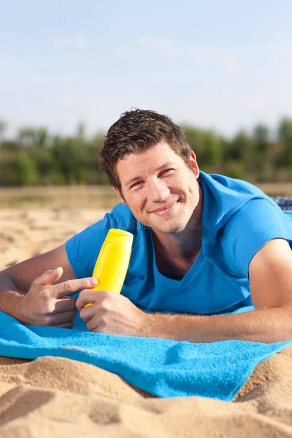 Young Man on Holidays with Sun Cream Stock Photo - Image of lotion ...