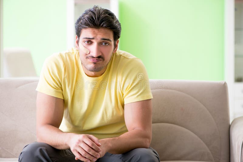 The Young Man at Home after Injury Stock Photo - Image of face, injured ...