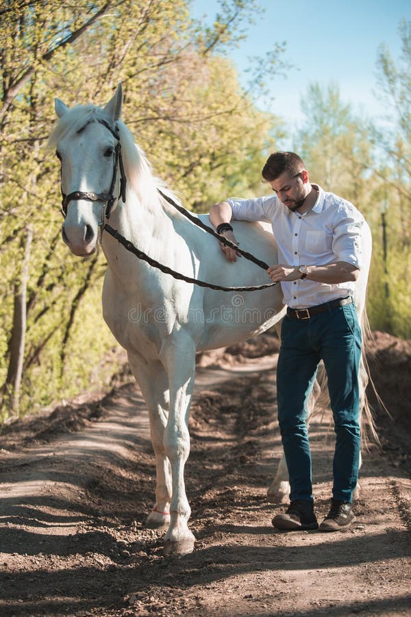 Young Man with Horse. Autumn Outdoors Scene Stock Photo - Image of ...