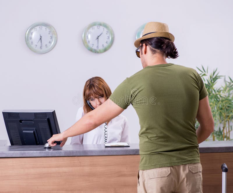 Young Man at the Hotel Reception Stock Image - Image of reception ...