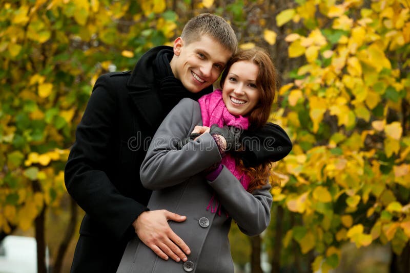 Young Man Hugging His Woman and they Smile Stock Photo - Image of ...