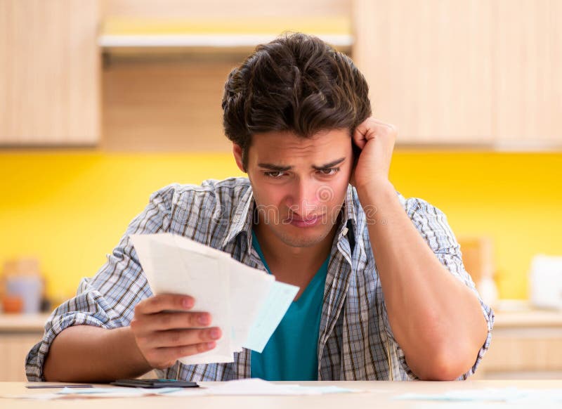 Young Man Husband in Budget Planning Concept Stock Photo - Image of ...