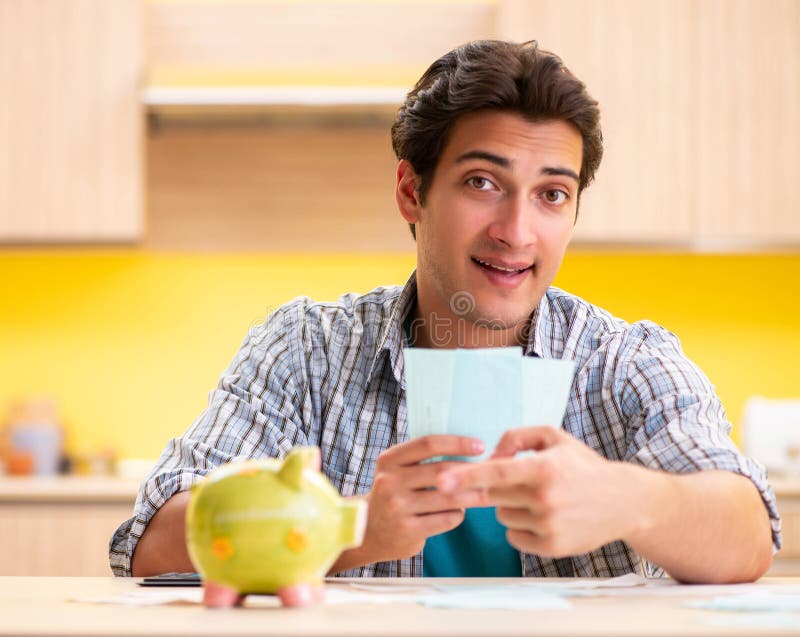Young Man Husband in Budget Planning Concept Stock Photo - Image of ...