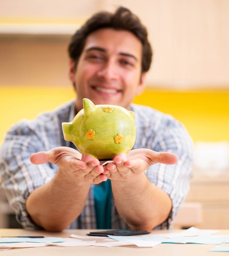 Young Man Husband in Budget Planning Concept Stock Photo - Image of ...