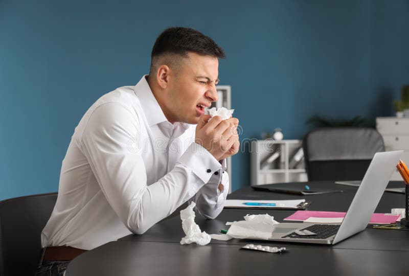 Young Man Ill with Flu in Office Stock Image - Image of remedy, blow ...
