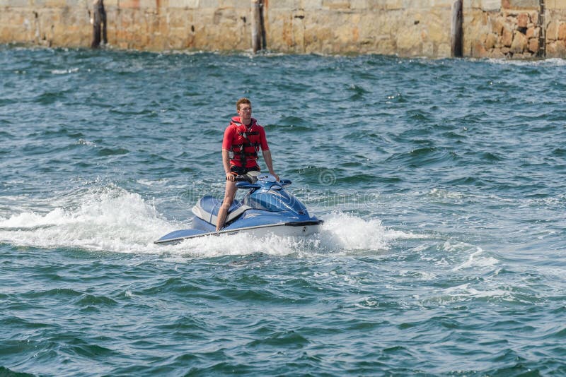 Young Man on a Jet Ski on the Sea Stock Image - Image of speed, power ...